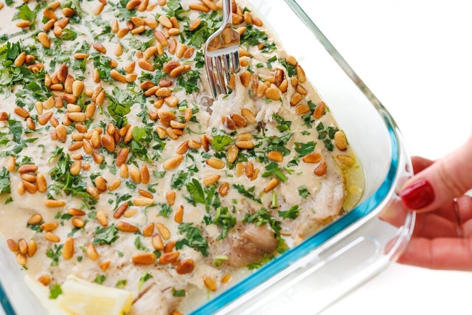 Lebanese Baked Fish with Tahini Sauce and Toasted Pine Nuts - The Lemon ...