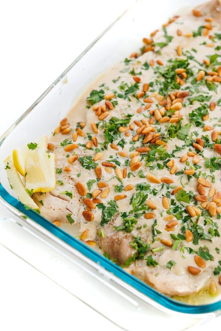 Lebanese Baked Fish with Tahini Sauce and Toasted Pine Nuts - The Lemon ...